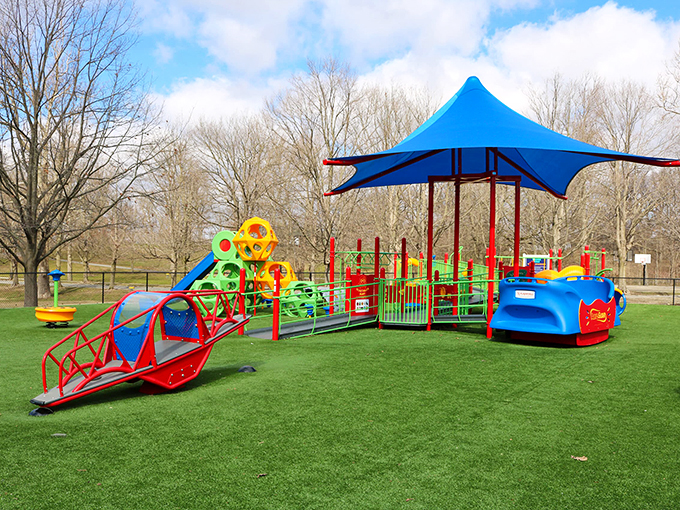 Even the playground equipment in Bellefontaine seems happier than elsewhere, sporting primary colors that pop against the green like a child's drawing come to life.
