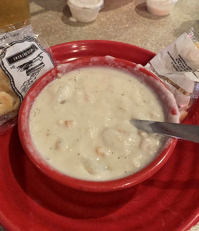 The holy grail of chowder—creamy, packed with clams, and served in that iconic red bowl that says, "Yes, this is the real deal."