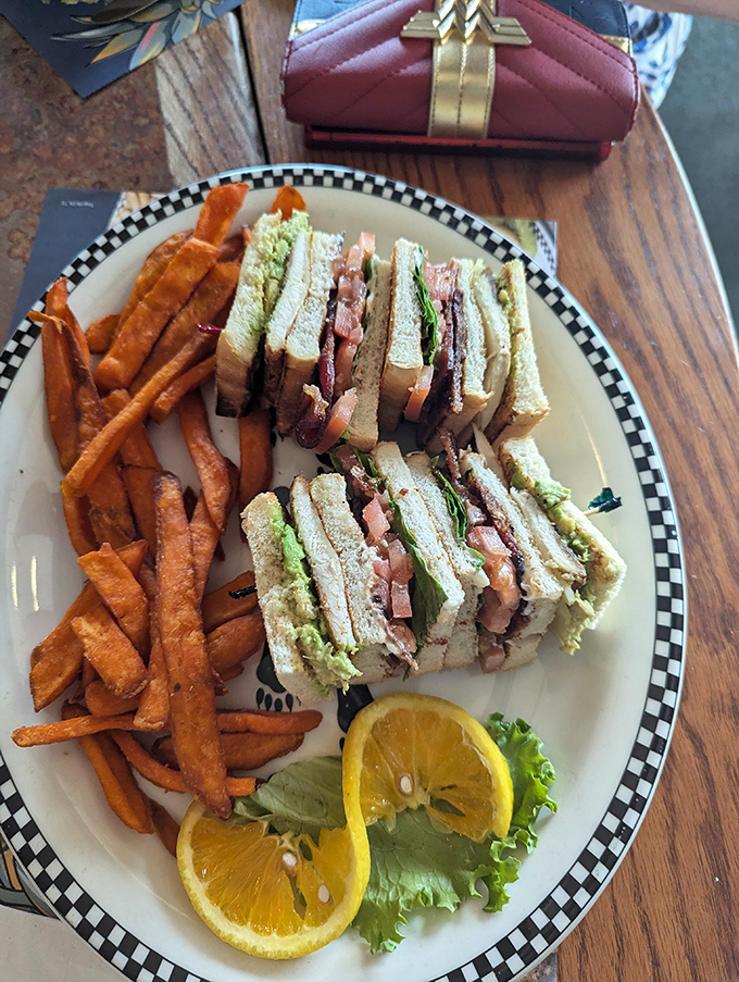 Behold the legendary Club Sandwich&mdash;a triple-decker monument to sandwich architecture with perfectly toasted bread, generous fillings, and those fancy little toothpicks.