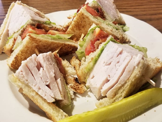 Architecture you can eat! This triple-decker club sandwich masterpiece proves that sometimes the simplest pleasures are stacked three layers high.