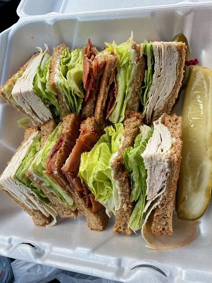 Behold the architectural marvel that is Pann's club sandwich&mdash;layers of fresh turkey, crisp bacon, and veggies creating the skyscraper of satisfaction.