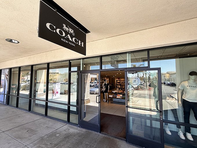The Coach outlet beckons with promises of luxury leather at prices that won't require a second mortgage or uncomfortable conversations with your accountant.
