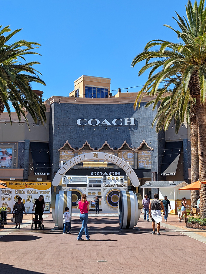 The Coach store commands attention with its grand fa&ccedil;ade, while the giant headphones installation reminds you this is California, not ancient Assyria.