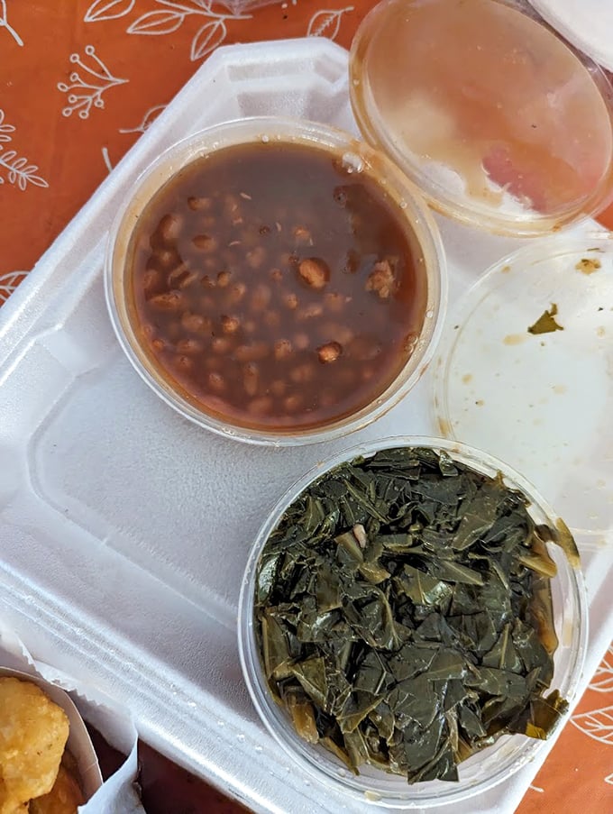 Soul in a container: baked beans with that perfect sweet-savory balance alongside collard greens that could make your grandmother jealous.
