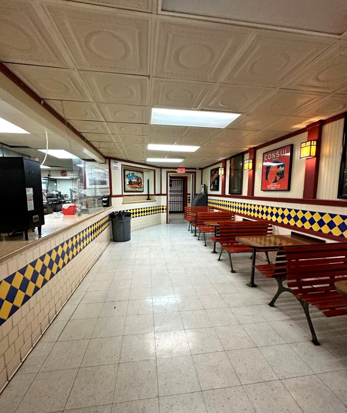 The concession stand's retro charm hasn't changed since your first date here&mdash;yellow and blue checkerboard tiles promising nostalgic flavors to come.