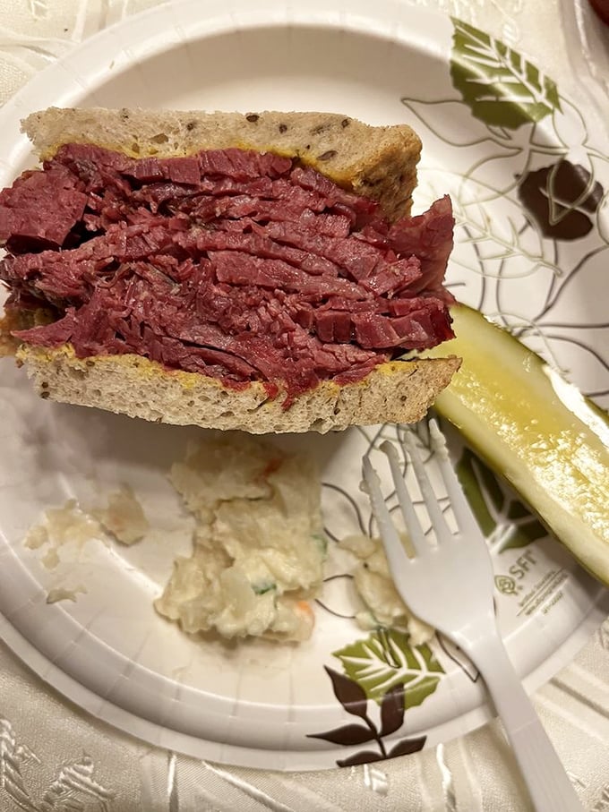 This towering corned beef sandwich requires an engineering degree and possibly a support group to tackle properly.