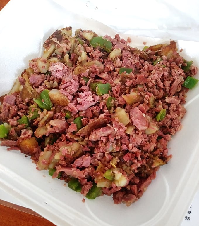 Behold the star of the show &ndash; chunky corned beef hash that makes canned versions weep with inadequacy, studded with perfectly diced potatoes and vibrant peppers.
