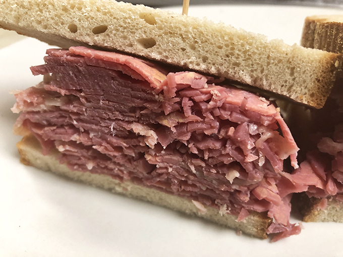 Behold the star attraction&mdash;layers of hand-sliced corned beef stacked with such generous abandon between rye bread that you'll need to strategize your first bite.