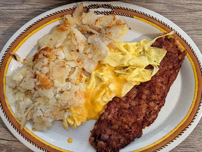 Crispy-edged corned beef hash that's achieved breakfast nirvana, paired with eggs and hashbrowns that could make a potato farmer weep with joy.