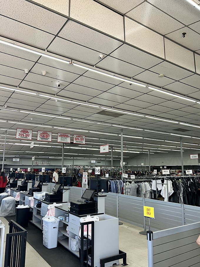 Checkout counters stand ready for thrifty victories, with signs advertising the color-coded discount system that rewards savvy shoppers.