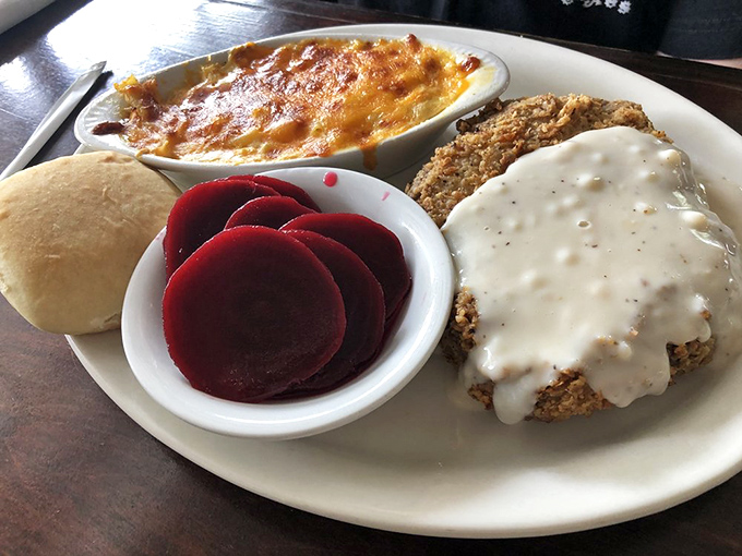 Country-fried indulgence that would make your cardiologist wince and your taste buds sing. That cream gravy could make cardboard taste like heaven.