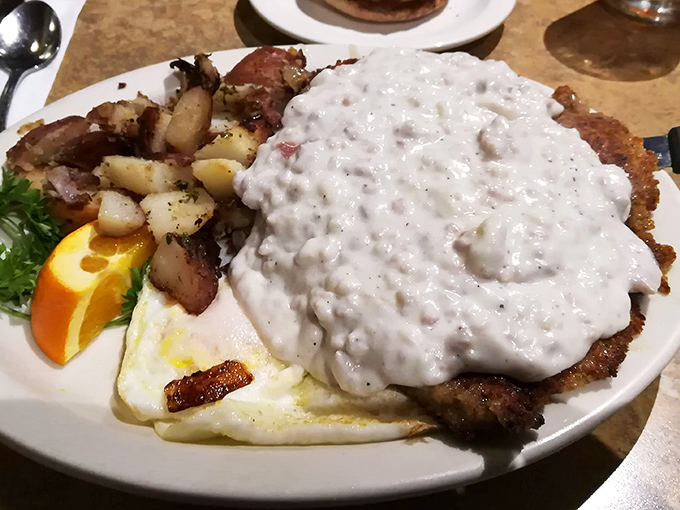 The holy grail of diner breakfasts: country fried steak swimming in pepper gravy so good you'll want to write poetry about it.