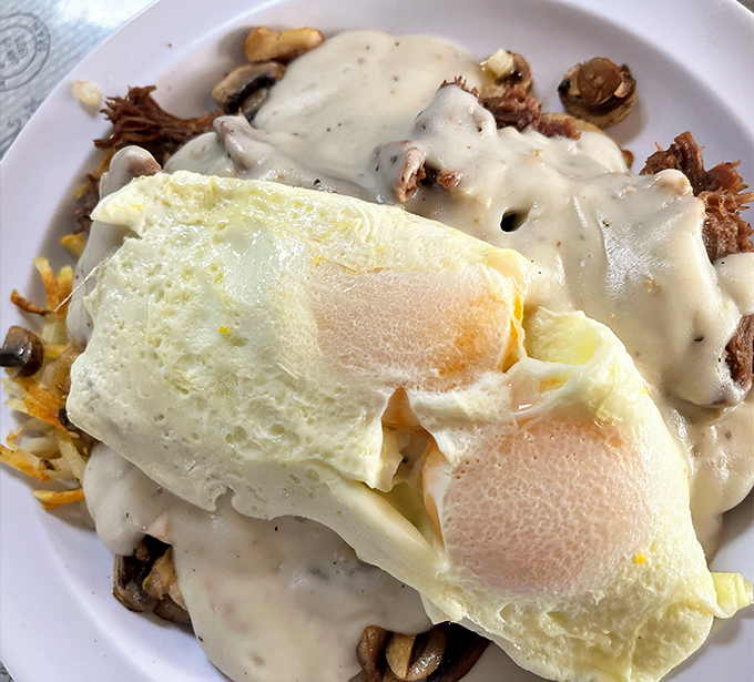 This country fried steak with eggs isn't just breakfast, it's a declaration of independence from sad protein bars and yogurt cups.