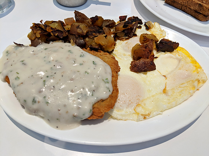 Country fried steak nirvana: golden-crisp exterior, tender meat, and gravy that would make your Southern grandmother weep with pride. Comfort on a plate.