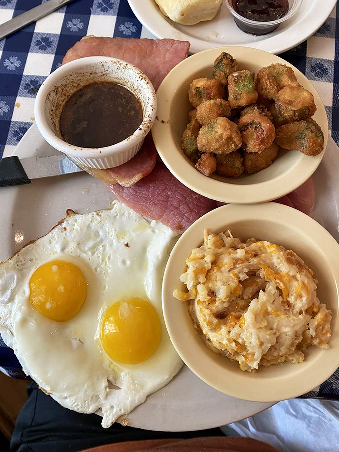 The country ham plate arrives like a Tennessee tableau: sunny eggs, red-eye gravy, and sides that make vegetarians question their life choices.