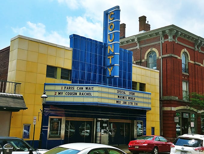 The County Theater's vibrant blue marquee lights up Main Street, a cinematic time machine where indie films find their audience and popcorn tastes better.