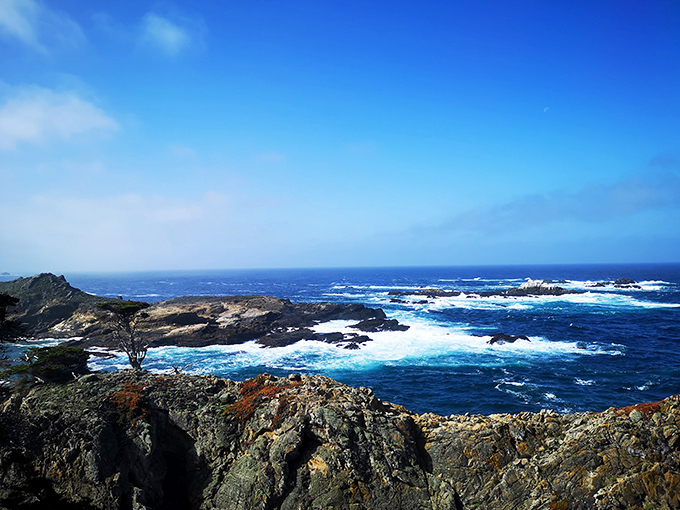 Where the land surrenders to the sea in a dramatic standoff that's been running longer than "Law & Order." The Pacific's blue intensity here would make Pantone jealous.
