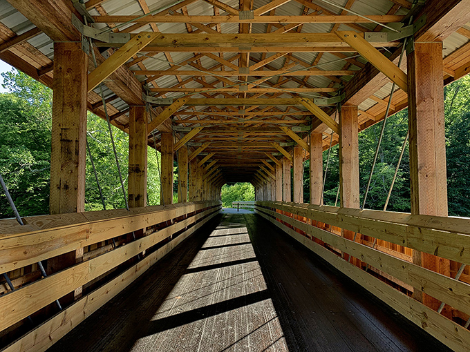 Inside the bridge, sunlight plays hide-and-seek between wooden beams. Architecture that whispers tales of craftsmanship and purpose.