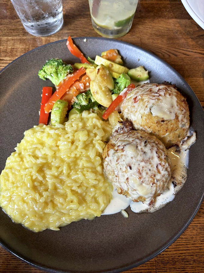Behold the star attraction: Buckley's crab cakes with creamy risotto and fresh vegetables &ndash; Delaware's answer to culinary nirvana.