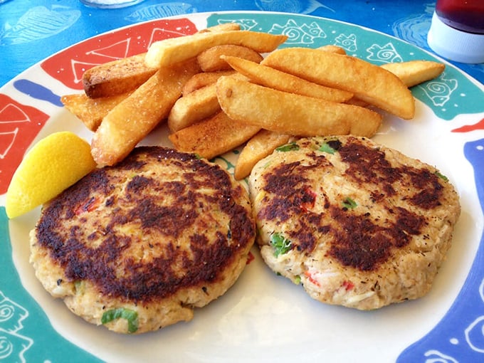 Behold the crab cakes that launch a thousand road trips - golden perfection that proves sometimes legends are absolutely true.