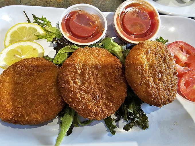 Golden-crisp crab cakes that would make Baltimore jealous, served with a side of Ohio hospitality and zesty dipping sauce.