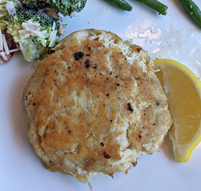 Behold the star of the show&mdash;a golden-brown crab cake that's more crab than cake, sitting proudly like Delaware's answer to the Hope Diamond.