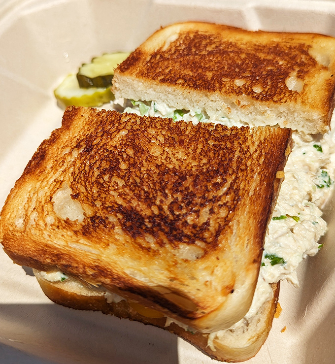 The legendary crab sandwich in all its glory &ndash; perfectly toasted bread cradling sweet, fresh Dungeness meat. Simplicity that speaks volumes.