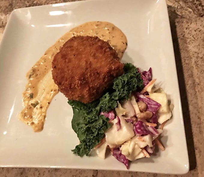 This isn't just a crab cake; it's a golden-crusted masterpiece of mostly crab with just enough binding to hold the party together.