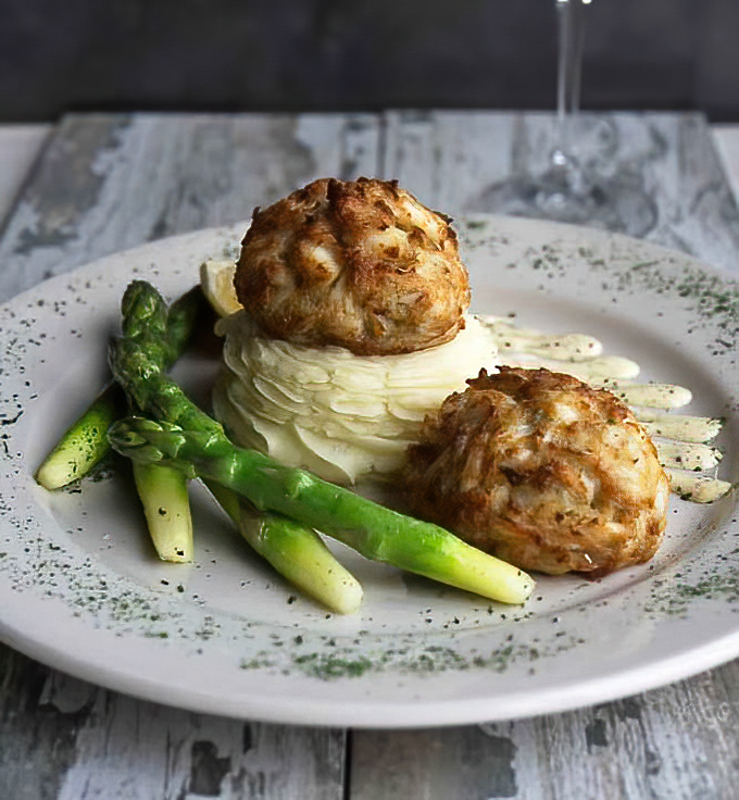 Not all heroes wear capes&mdash;some come broiled to golden perfection atop mashed potatoes. These crab cakes contain so much jumbo lump meat, they're practically a shellfish reunion.