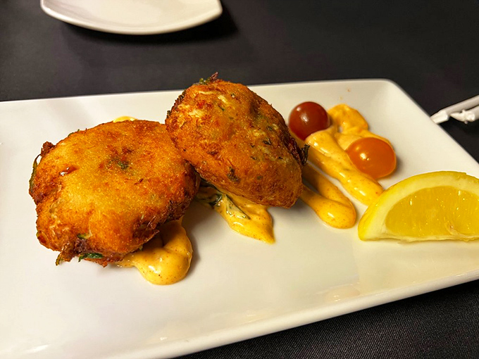 Golden-brown perfection! These crab cakes are what seafood dreams are made of&mdash;mostly crab, minimal filler, and that remoulade sauce deserves its own fan club.