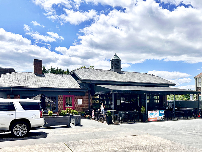 Local hangouts like this restaurant offer outdoor seating perfect for people-watching while sipping coffee that costs half what you'd pay in Northern Virginia.