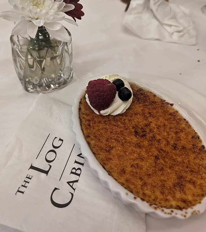 Behold the legendary cr&egrave;me br&ucirc;l&eacute;e&mdash;its perfectly caramelized top waiting to be cracked like nature's most delicious geode, crowned with fresh berries.