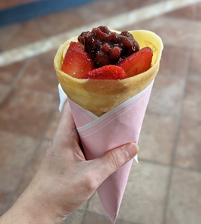 This isn't just a crepe&mdash;it's a handheld celebration with red bean paste and fresh strawberries playing the starring roles.