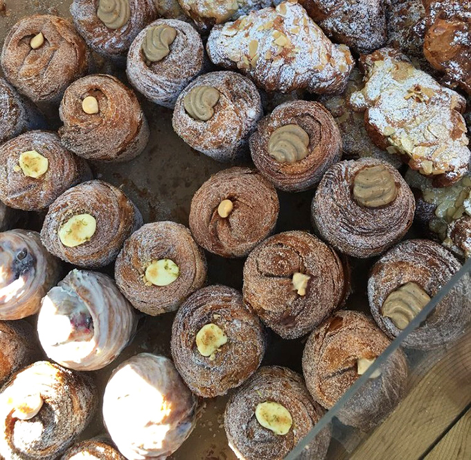 Behold the cruffin army, standing at attention with their spiral layers and creamy centers. Resistance is futile, surrender delicious.