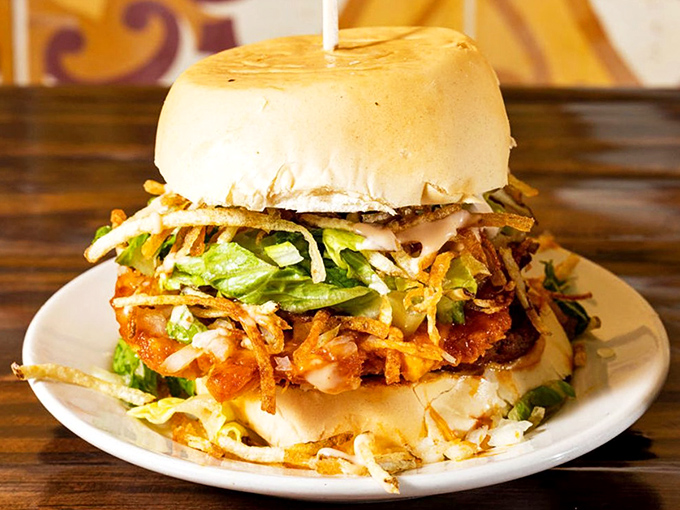 Behold the Big Magic Frita in all its glory&mdash;a seasoned patty crowned with crispy shoestring potatoes and fresh toppings that'll make your regular burger jealous.
