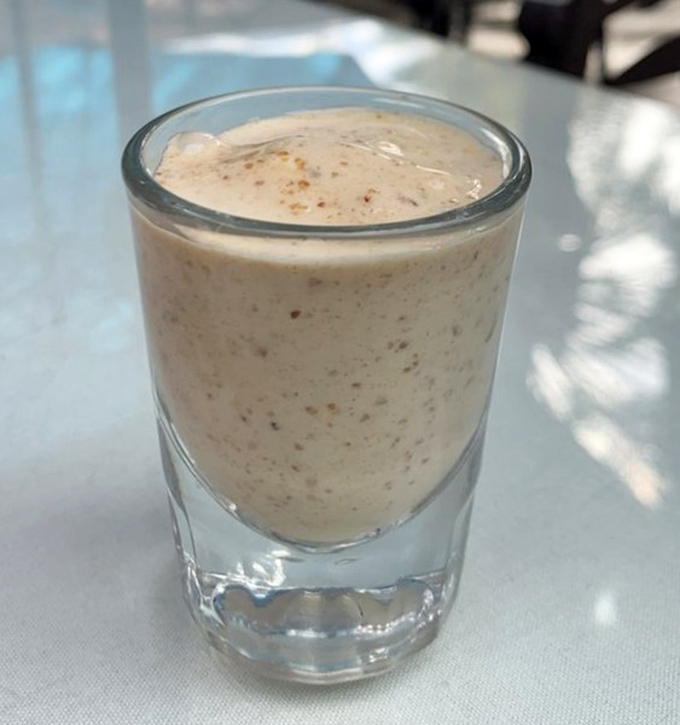 Behold the legendary date shake&mdash;tiny speckles of nature's candy suspended in creamy paradise. Worth every mile of your desert pilgrimage.