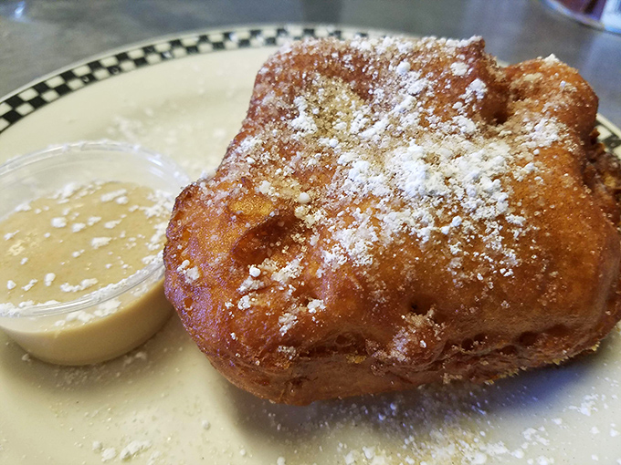 Cinnamon rolls aren't supposed to be deep-fried, but after tasting this powdered sugar-dusted masterpiece, you'll wonder why they aren't everywhere. Sweet rebellion at its finest.