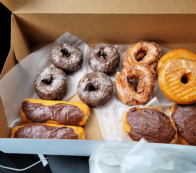 A box of edible treasures that makes grown adults act like kids on Christmas morning. The glazed ones practically whisper your name.