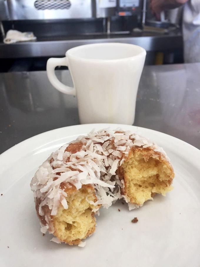 Behold the coconut-covered masterpiece that proves this burger joint takes its donuts seriously indeed.