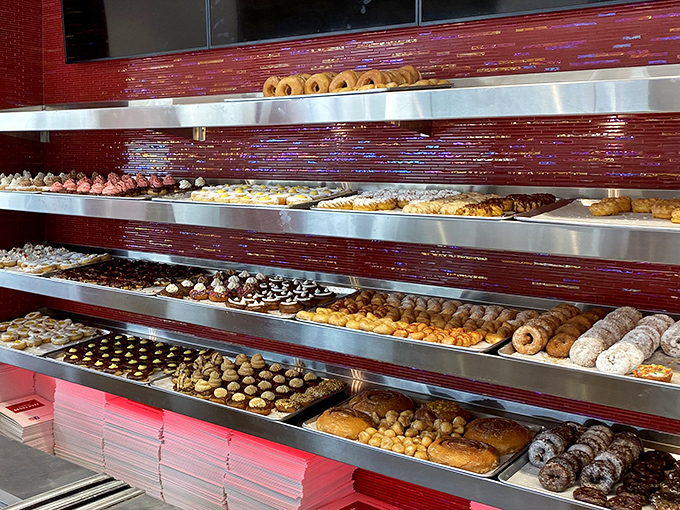 The Great Wall of Donuts. Each shelf a different adventure, each row a new possibility for breakfast bliss.