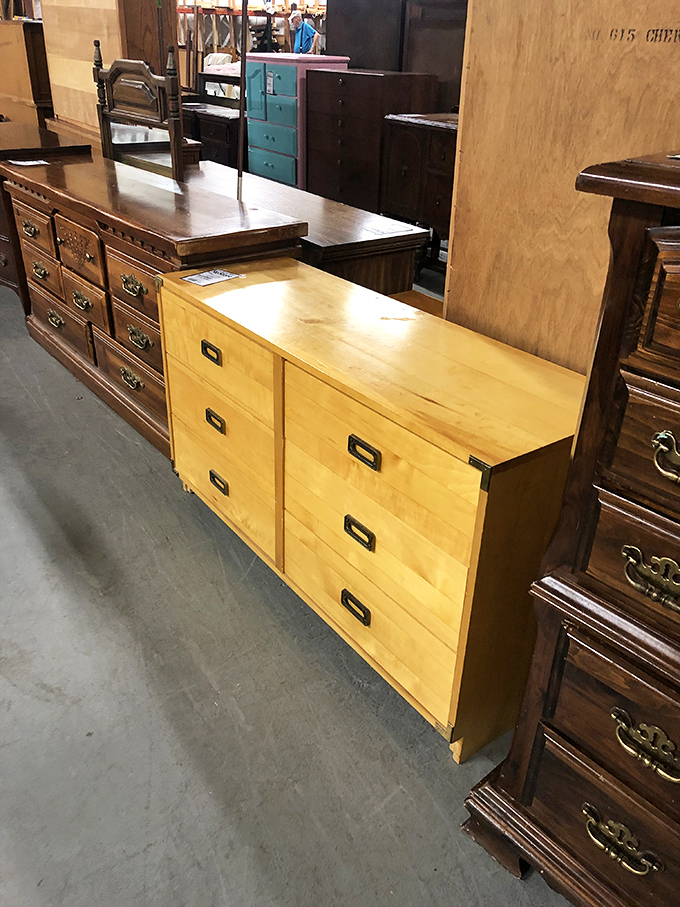 Mid-century meets modern functionality in this blonde wood dresser. Marie Kondo would approve of all the storage space for things that definitely spark joy&mdash;or at least spark memories.