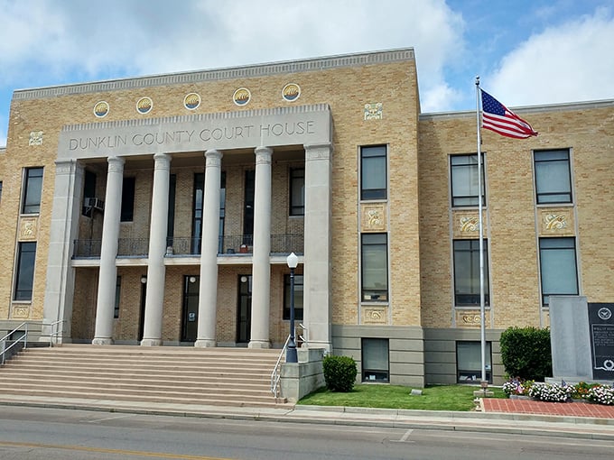 The Dunklin County Courthouse stands as a dignified sentinel of small-town governance. Its columns and brick facade speak to permanence in an impermanent world.