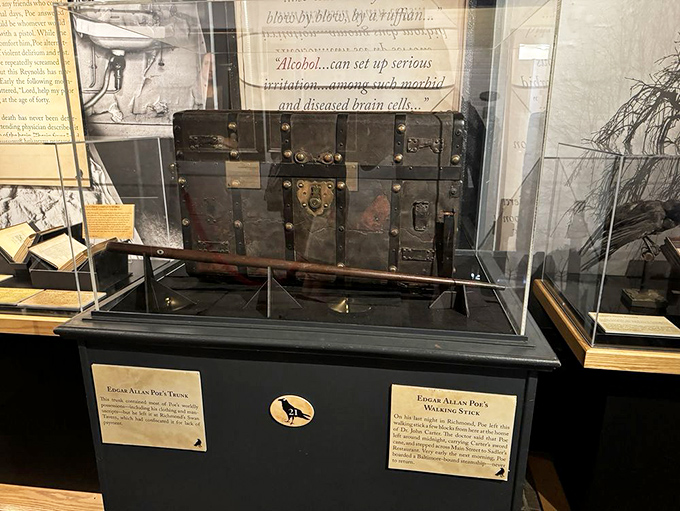 This weathered trunk holds secrets from Poe's travels, each scratch telling tales of a restless creative spirit.