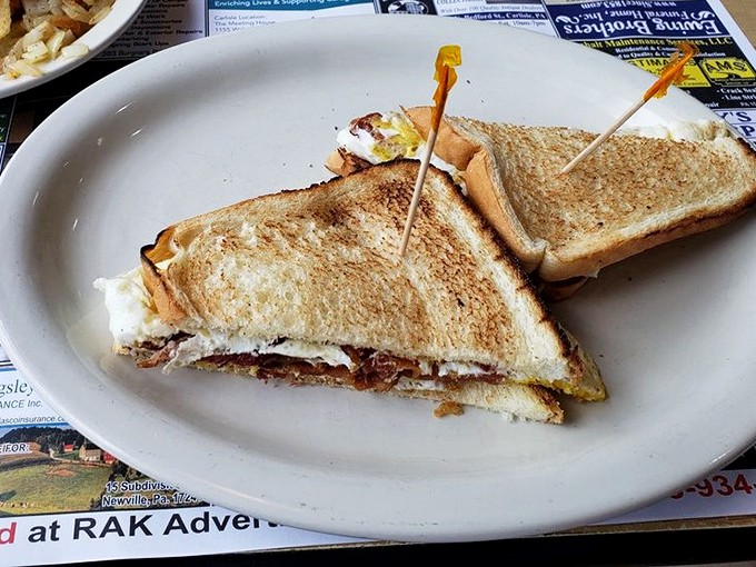 The legendary egg sandwich in all its glory&mdash;perfectly toasted bread embracing eggs and bacon like old friends at a reunion. Worth driving across county lines for.
