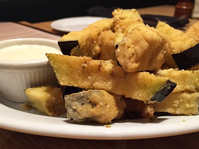 These aren't your grandmother's eggplant slices. Crispy, golden batons with creamy interiors that could convert even the most dedicated vegetable skeptics.