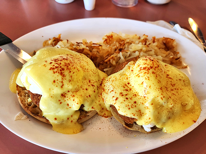Behold the star of our show&mdash;Eggs Benedict with perfectly poached eggs wearing their hollandaise coats like sunshine-colored royalty.