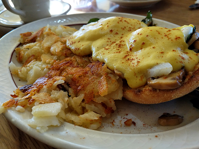 Behold the star attraction: Eggs Benedict with perfectly poached eggs and hollandaise that would make a French chef weep with joy.