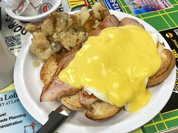 Behold the star of the show &ndash; a Ham from the Bone Benedict with hollandaise so golden it deserves its own Fort Knox.