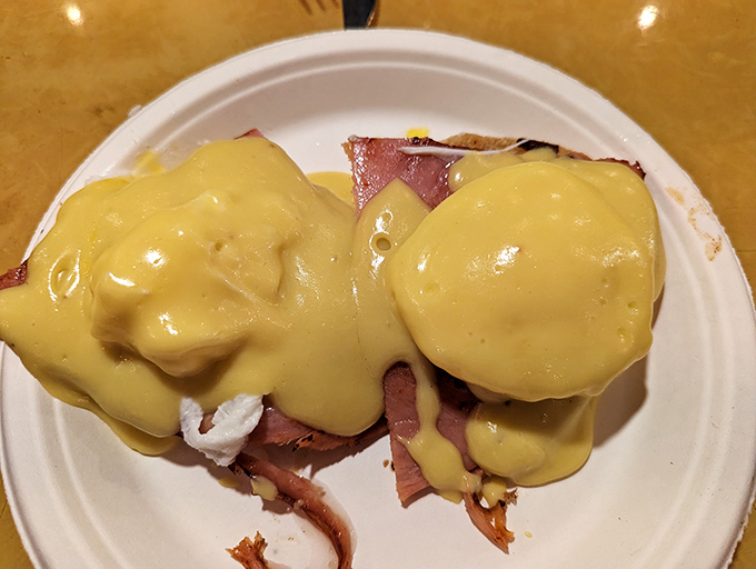 Behold the star of the show: Eggs Benedict that would make a French chef weep with joy. That hollandaise sauce should have its own fan club.