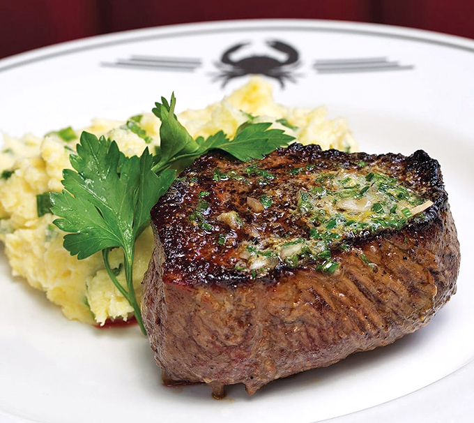This filet mignon isn't just cooked—it's been sweet-talked to perfection. The mashed potatoes aren't bad company either.